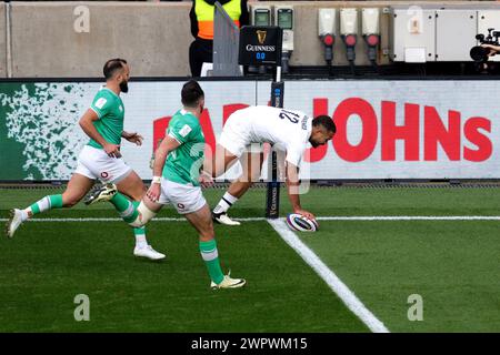 England Ollie Lawrence scores a try during the rugby union Nations ...