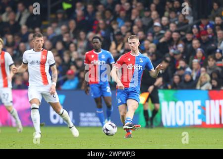 Adam Wharton of Crystal Palace passes the ball during the Premier League match Manchester United ...