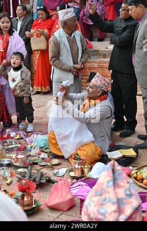 Nepalese master of ceremony celebrating a typical newari wedding in the ...