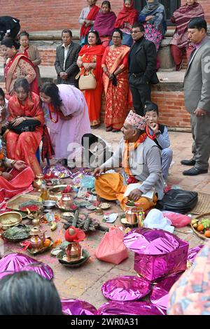 Nepalese master of ceremony celebrating a typical newari wedding in the ...