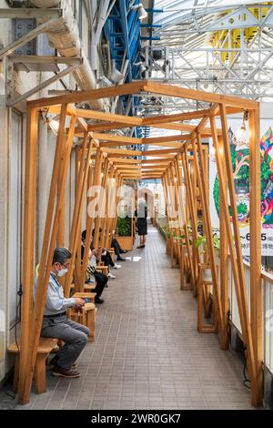 Free to use wooden seat cubicles outside a bookshop on the second level ...