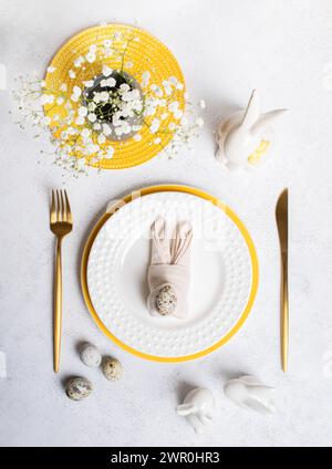 Beautiful table setting with gypsophila flowers on color wooden ...