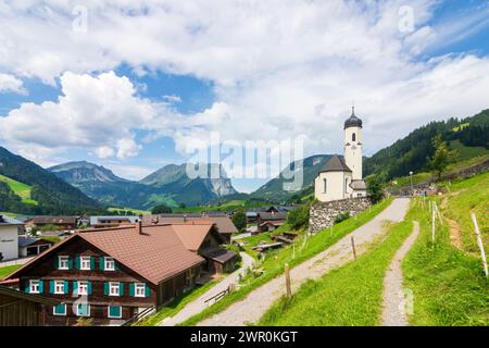 Schoppernau: church Schoppernau, mountain Kanisfluh in Bregenzerwald ...