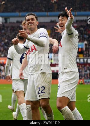 Tottenham Hotspur's Brennan Johnson (left) with his partner Tilde Syah on the pitch after the ...