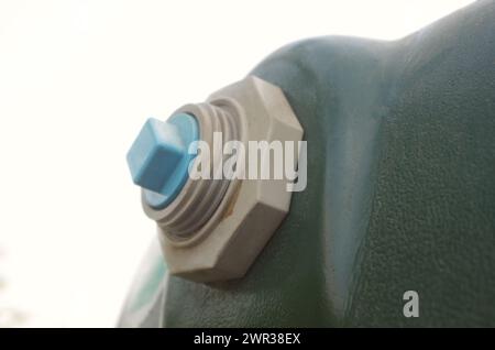 Blue plastic plug for closing the water system on large water tanks ...
