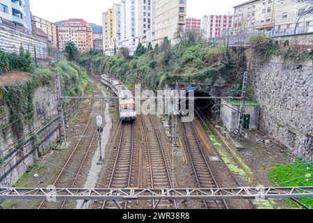 upper floor of Zabalburu railway station with trains moving. Bilbao ...