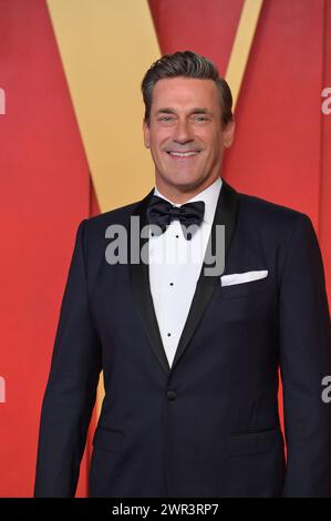 USA. 10th Mar, 2024. Jon Hamm and Anna Osceola walking on the red ...