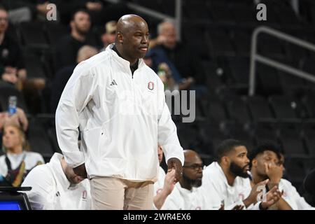 Nebraska-Omaha Mavericks head coach Chris Crutchfield summons one of ...