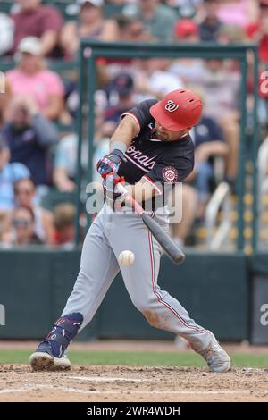 Washington Nationals left fielder Jake Alu catches a fly ball hit in by ...