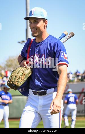 Texas Rangers' Evan Carter walks to the dugout after an out against the ...