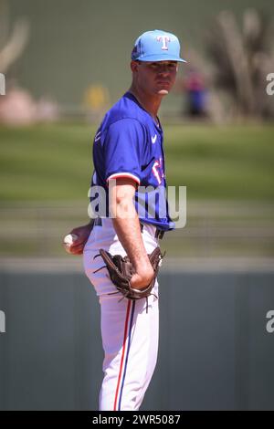 Texas Rangers starting pitcher Cody Bradford casts a shadow as he ...