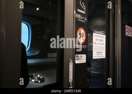 Nagoya, Japan. 9th Mar, 2024. A notice is displayed outside a smoking ...