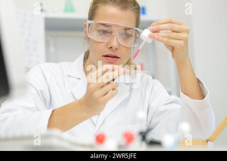 Laboratory technician with micro pipette Stock Photo - Alamy