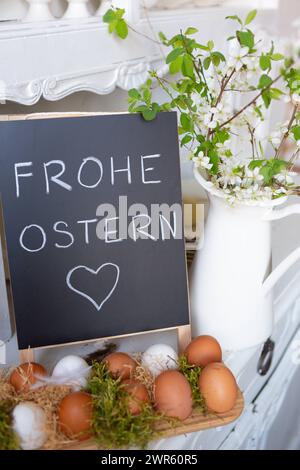 3 March 2024: Happy Easter, greeting made of wooden letters on a ...