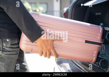 Loading bag trip vacation time Stock Photo - Alamy