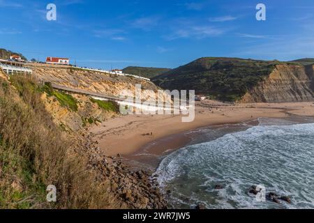 Sintra, Portugal: February 17, 2024: People at the beach of Magoito in ...