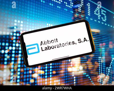 In this photo illustration, the Abbott Laboratories company logo is ...