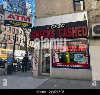 A check is cashed at a new check cashing ATM at Riggs Bank in ...