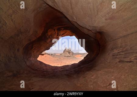 Rock formation with an erosive window in the Sahara desert, Algeria ...