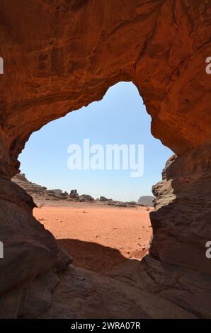Rock formation with an erosive window in the Sahara desert, Algeria ...