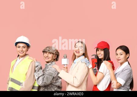Women of different professions on pink background Stock Photo - Alamy