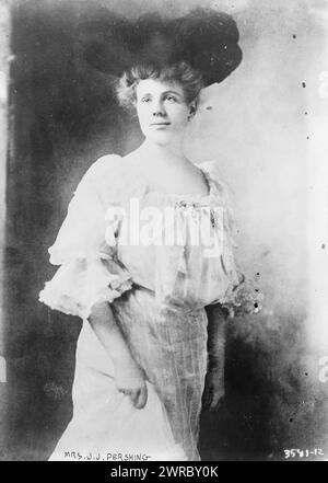 A photograph of General John J. Pershing with Mrs. J.A. Hull ...