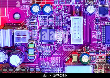 computer main board with sockets and chips. high-detailed view in blue ...