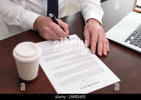 Hand of businessman signing a contract (Lorem ipsum text used Stock ...