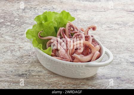 Marinated squid kalamri tentacles in the bowl Stock Photo - Alamy