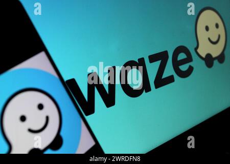 In this photo illustration, the Waze logo is displayed on a smartphone ...
