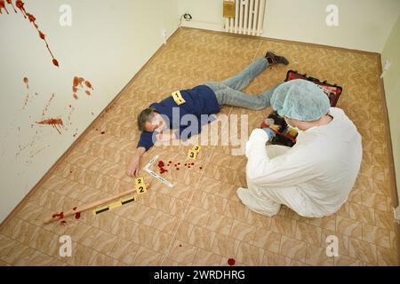 Crime scene investigation - photographing of place of crime Stock Photo ...