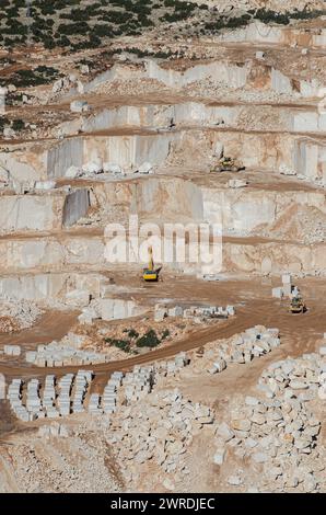 Working the Open Pit Marble Mine at Tatlock. A large mining truck full ...