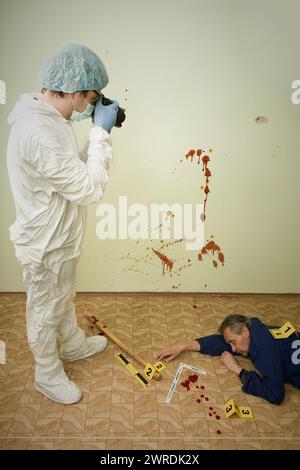 Crime scene investigation - photographing of place of crime Stock Photo ...