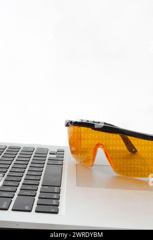 The blue light blockers has data reflected on the lenses Stock Photo ...
