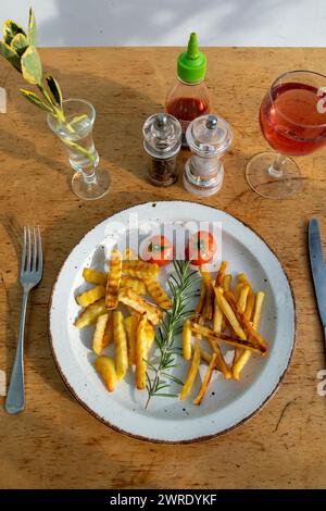 An elegantly simple dinner place setting with a main course of chips ...