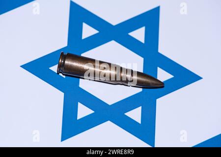 Israel flag with weapon ammunition. War between Israel and Palestine ...