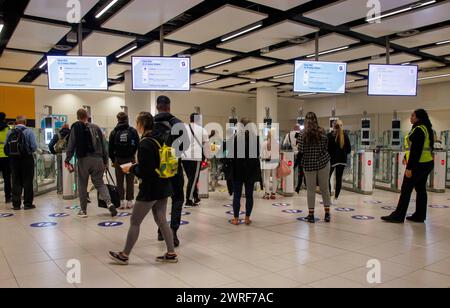 Arrivals at the passport gates at Gatwick Airport where biometric ...