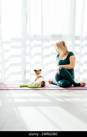 Sports training at home with pets Stock Photo - Alamy