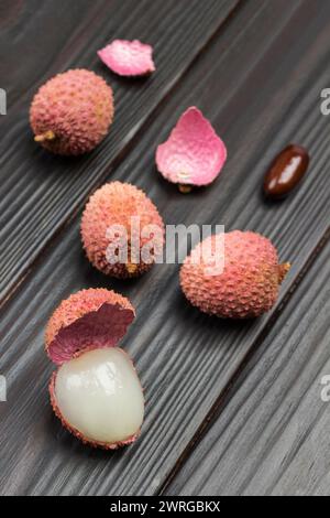 Top view lychee fruit on wooden background Stock Photo - Alamy