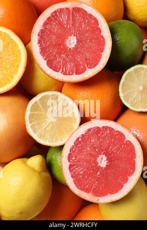 Different citrus fruits background, top view. Lemons and oranges Stock ...