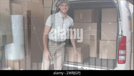 Rear view of a deliveryman loading packages in the back of a van Stock ...