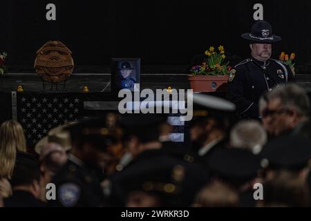 Washington State Patrol troopers solemnly perform a ceremony honoring ...