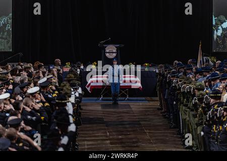 Washington State Patrol troopers solemnly perform a ceremony honoring ...