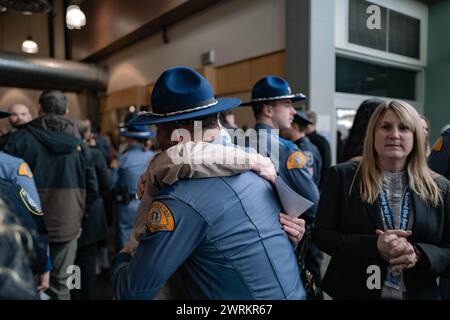 Fellow troopers attend the memorial ceremony of Washington State Patrol ...