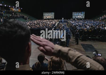 Washington State Patrol troopers solemnly perform a ceremony honoring ...