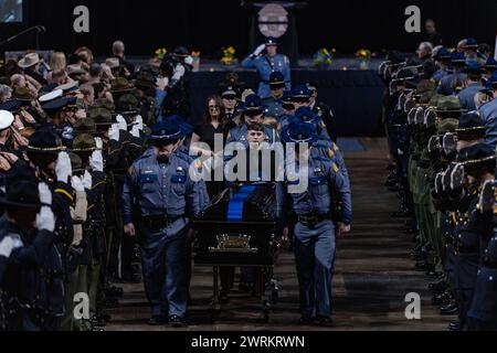 Washington State Patrol troopers solemnly perform a ceremony honoring ...