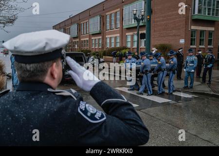Washington State Patrol troopers accompany the casket of their fallen ...