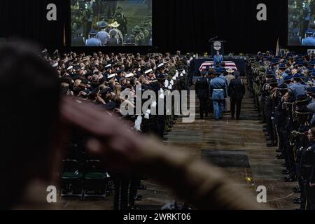 Washington State Patrol troopers solemnly perform a ceremony honoring ...