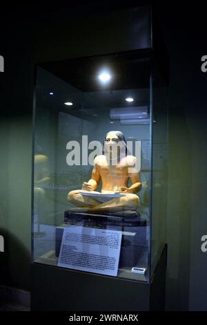 The sculpture of the Seated Scribe or Squatting Scribe is a famous work ...