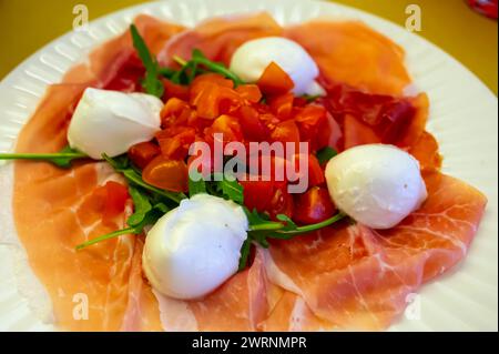 Cuisine of Emilia-Romagna region, Caprese salad with Prosciutto crudo ...
